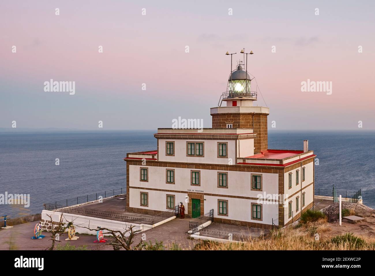 Finisterre lighthouse at sunset. Costa da Morte in Galicia. Atlantic ...