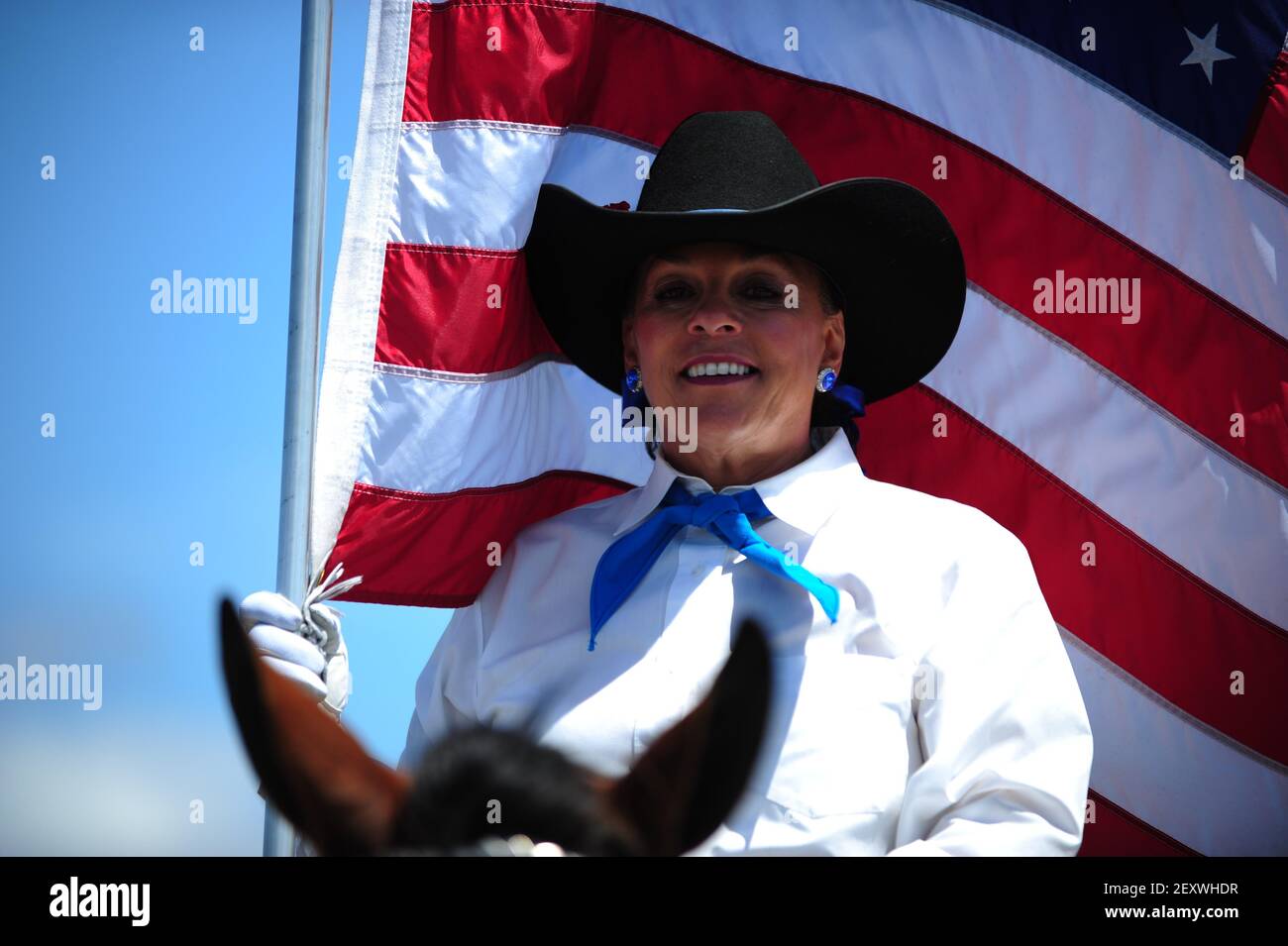 A rodeo queen makes her way over the Burnside Bridge during the Grand ...