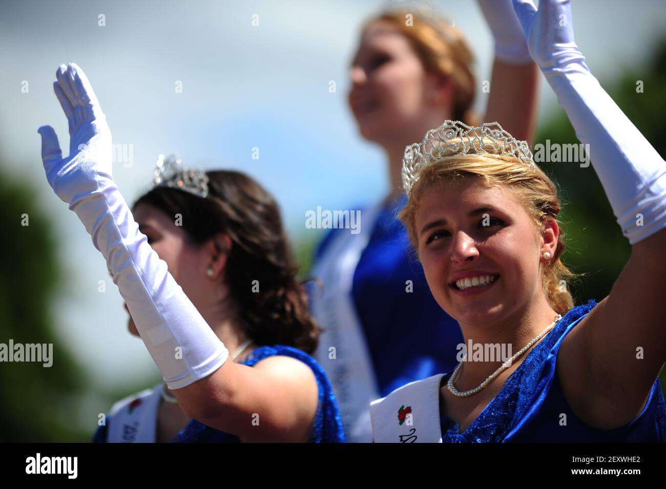 Queens wave to the crowd during the Grand Floral Parade on June 7th ...