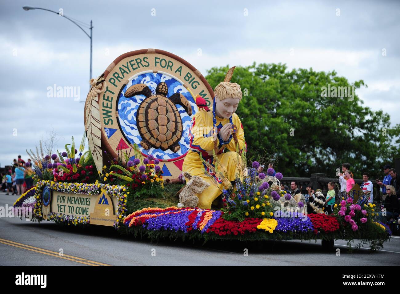 A float passes over the Burnside Bridge during the Grand Floral Parade ...