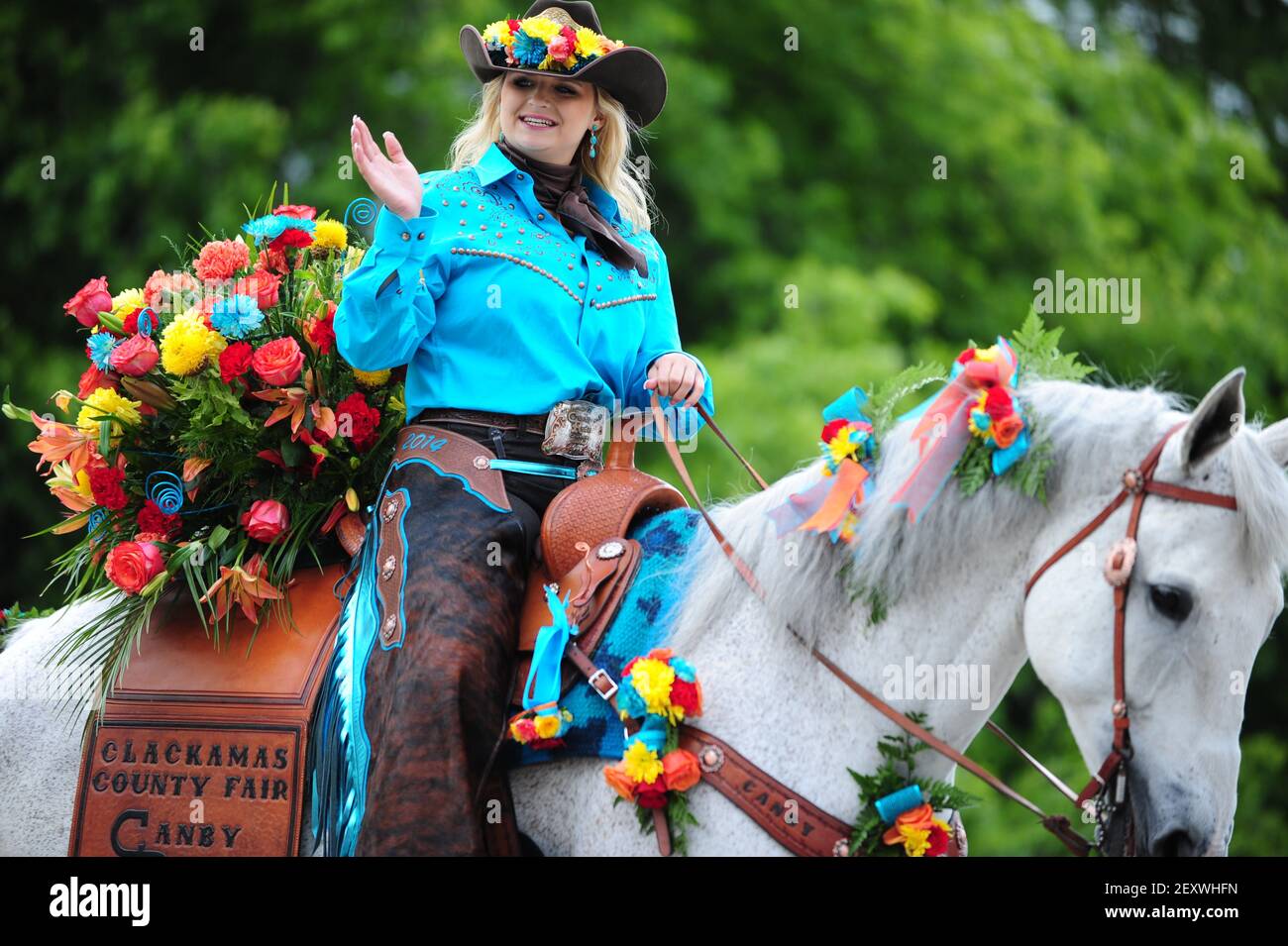 A Clackamas county fair queen waves to the crowd on the Burnside Bridge ...