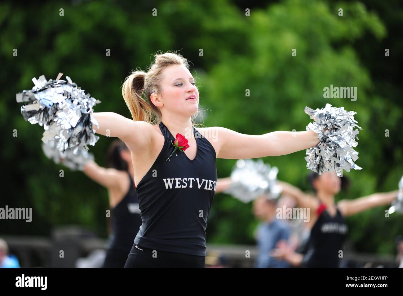 Westview high school cheerleaders take part in the Grand Floral Parade ...