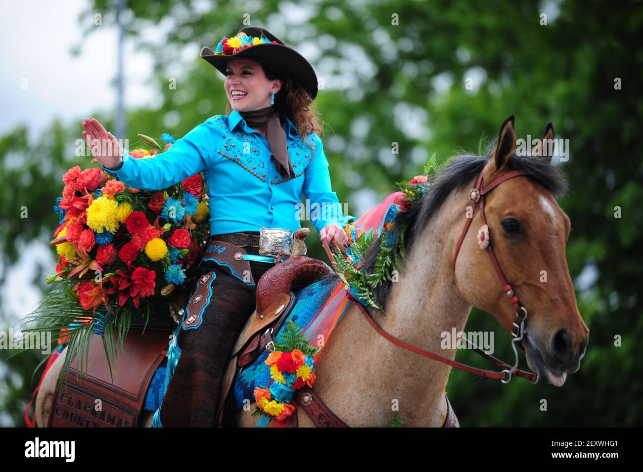 A Clackamas county fair queen waves to the crowd on the Burnside Bridge ...