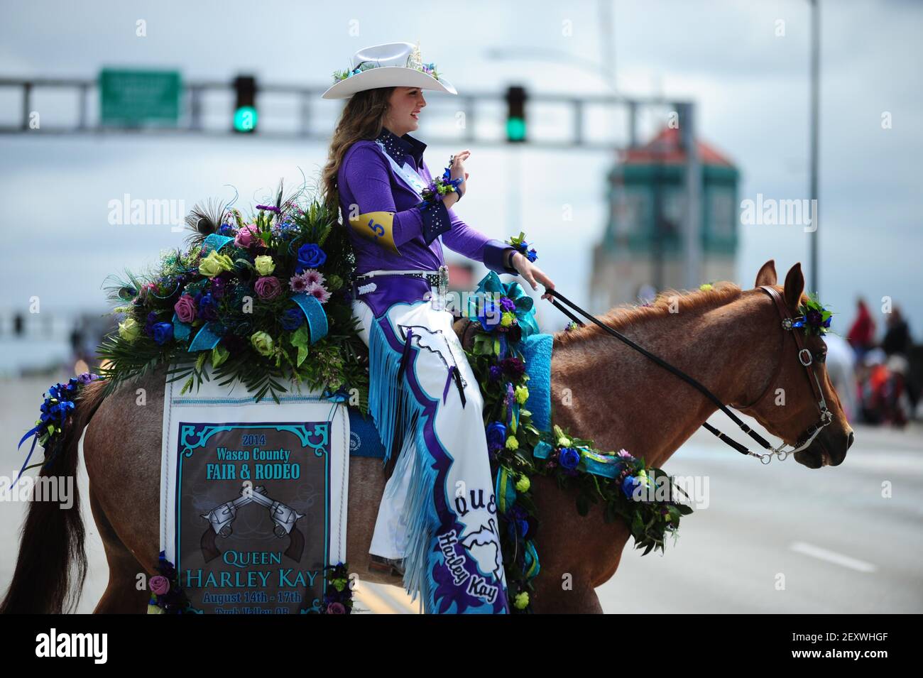 Wasco County fair and rodeo queen Harley Kay waves to the crowd on the ...