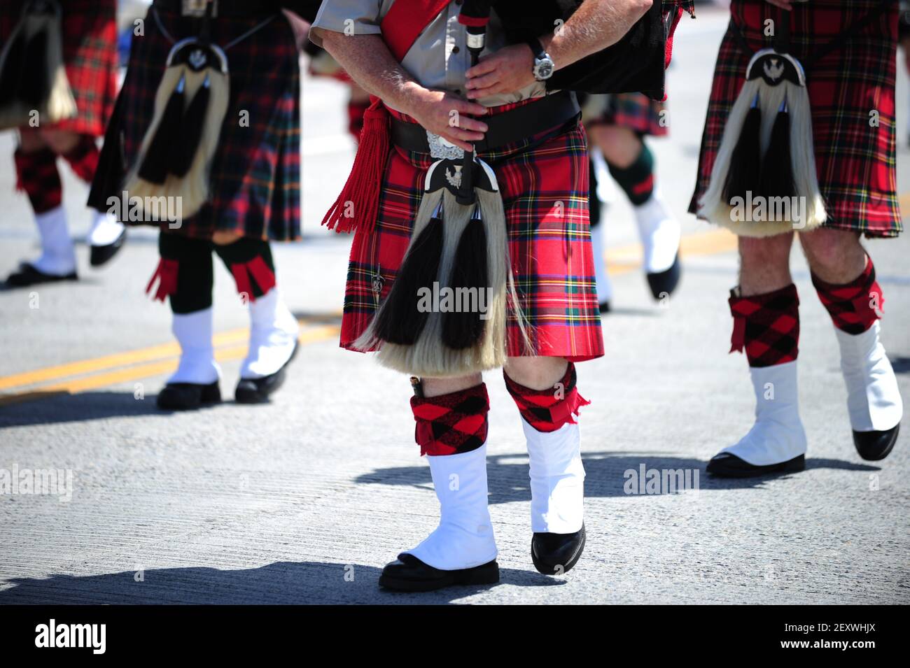 Bagpipe wielding men march across the Burnside Bridge during the Grand ...