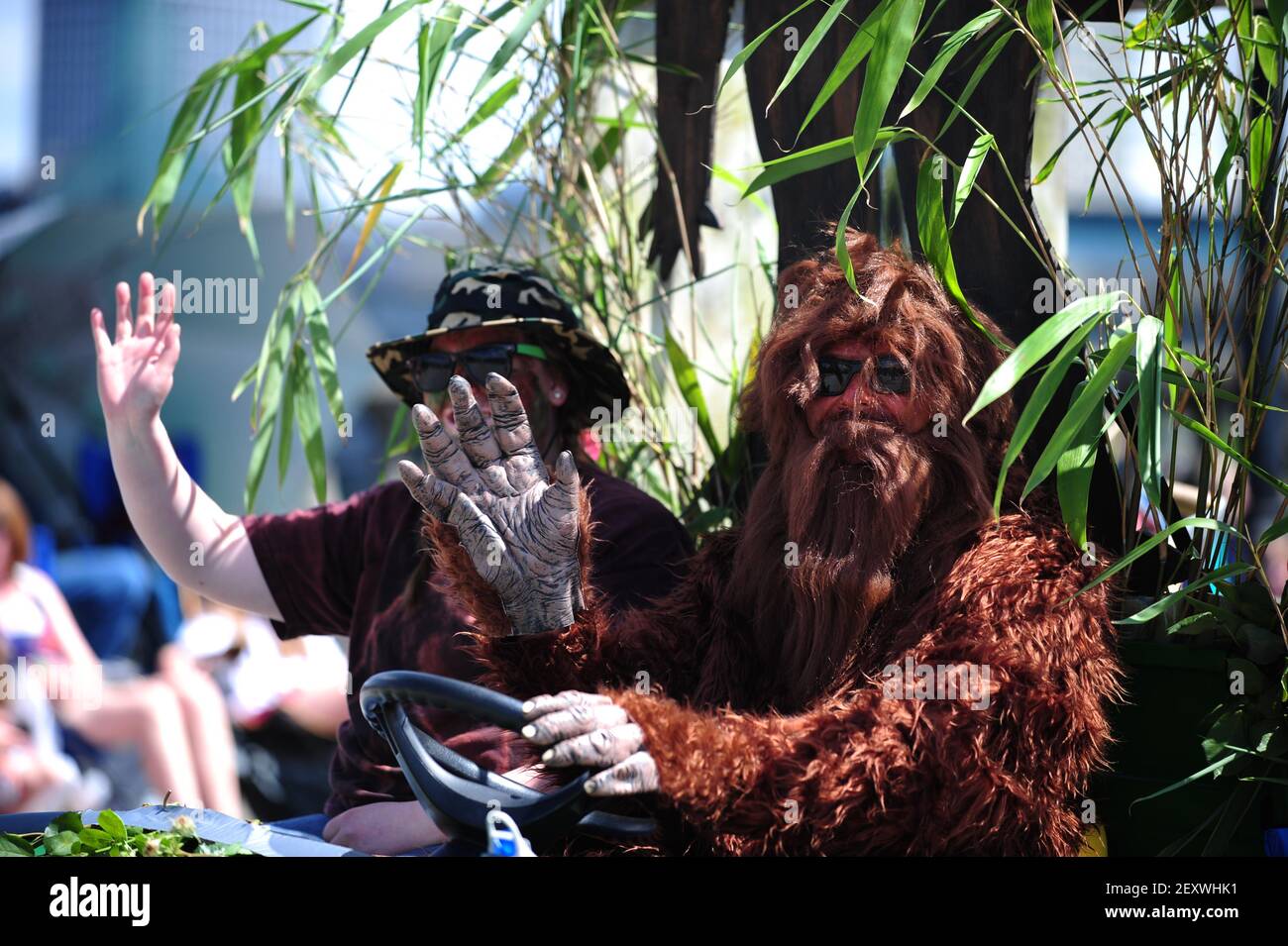 A man dressed as a Sasquatch drives a cart during the Grand Floral ...