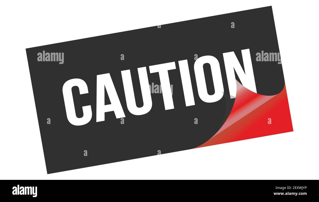 CAUTION text written on black red sticker stamp Stock Photo - Alamy