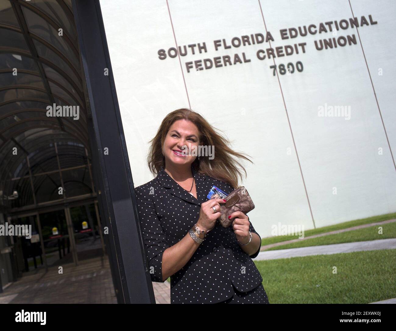 South Miami High School teacher Patricia Acosta uses payroll deductions ...