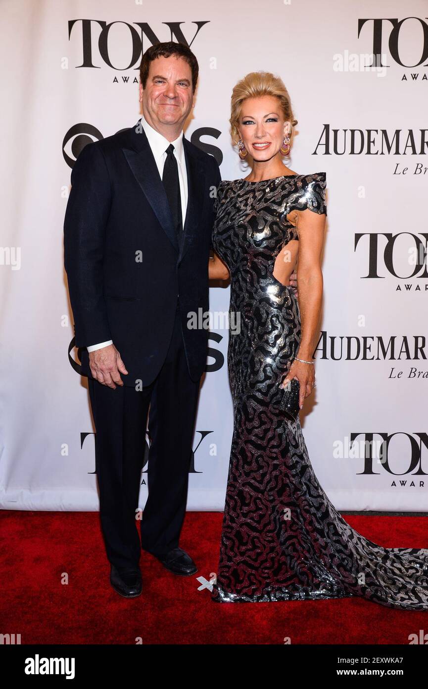 Kari Wagner and Todd Wagner arrive on the red carpet at the Tony Awards ...