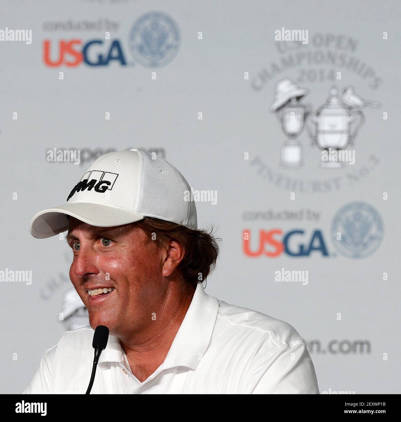 Golfer Phil Mickelson talks to the media during a press conference at ...