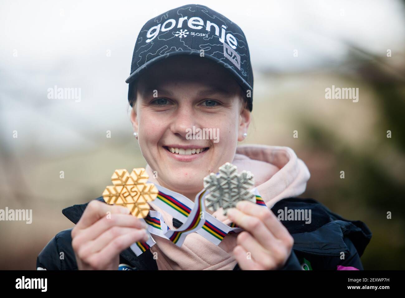 Ema Klinec poses with her medals in her home village of Poljane ...