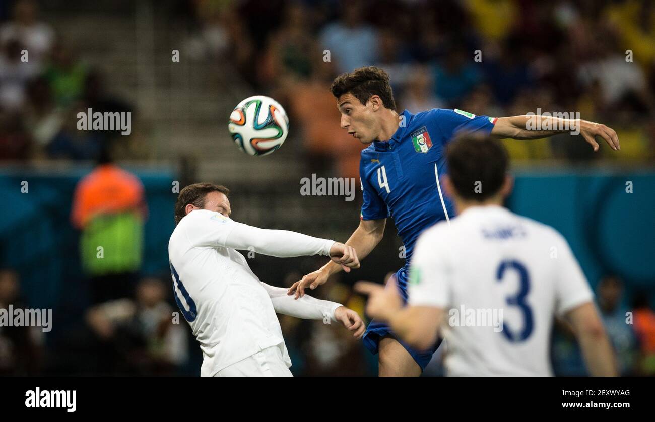 Italy's Matteo Darmian heads the ball during the group D 2014 FIFA ...