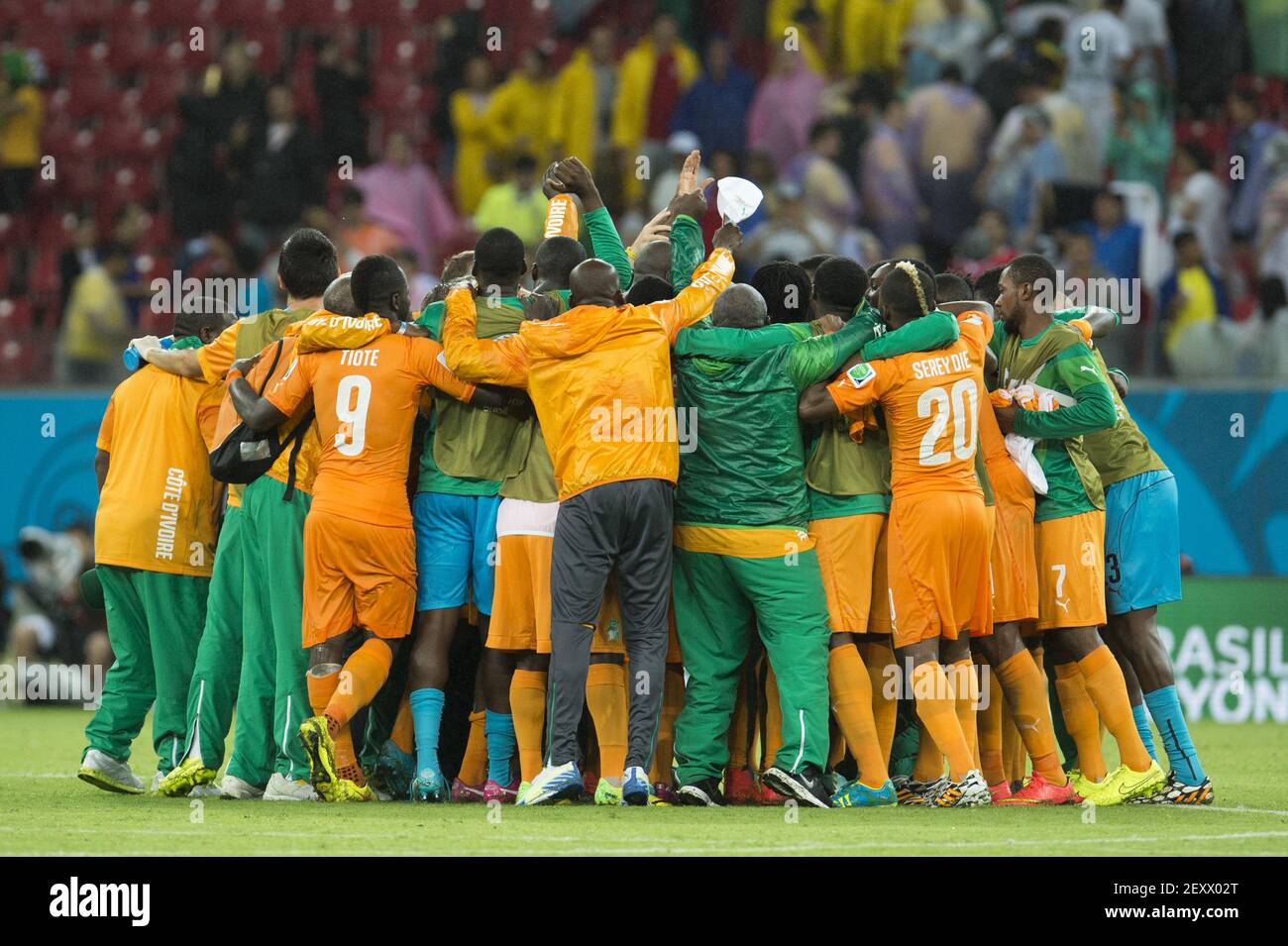 Cote d'Ivoire's players celebrating their victory on the group C 2014 ...