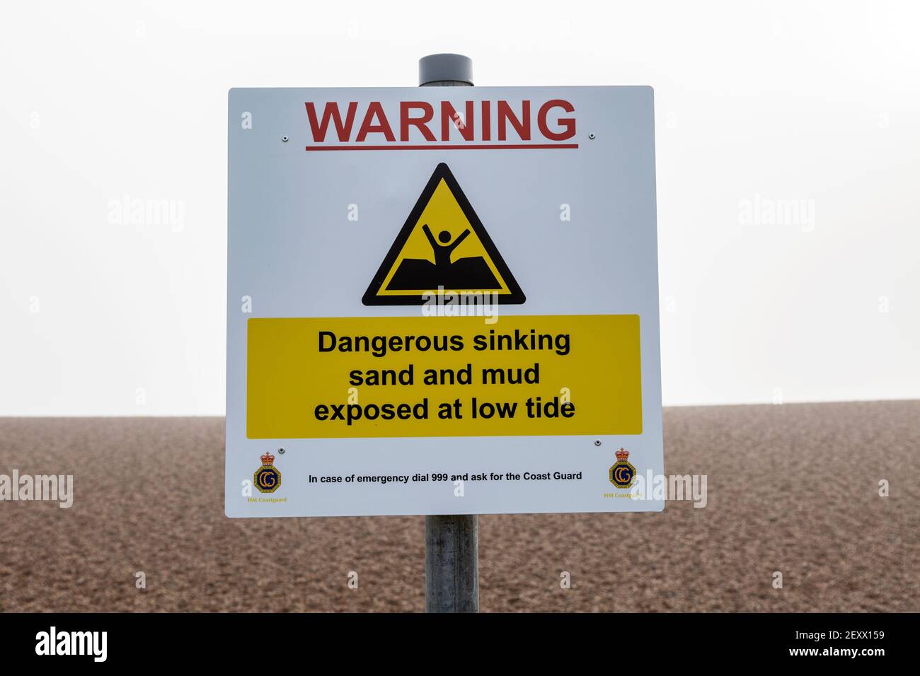 Sign warning of dangerous sinking sand and mud at low tide, Shingle ...