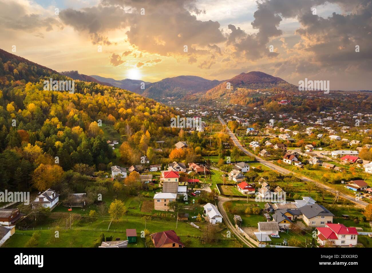 Aerial view of a village rural area with small houses between autumn ...
