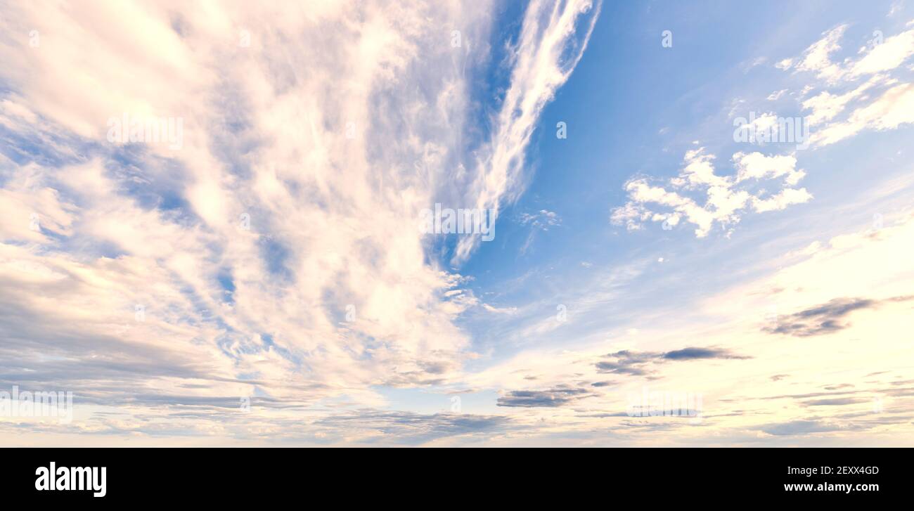 Blue sky with white cumulus clouds in daytime sunlight Stock Photo - Alamy