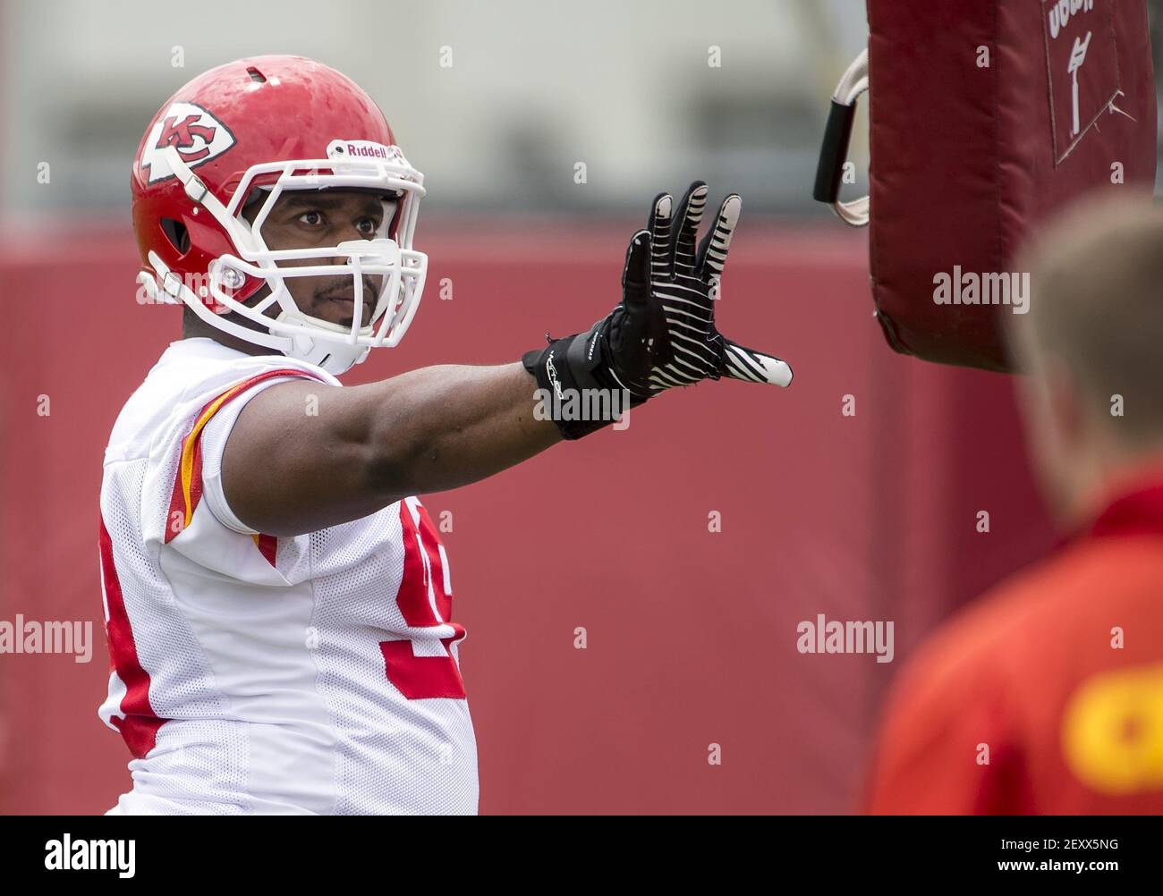 Kansas City Chiefs defensive end Vance Walker (99) reached for a ...