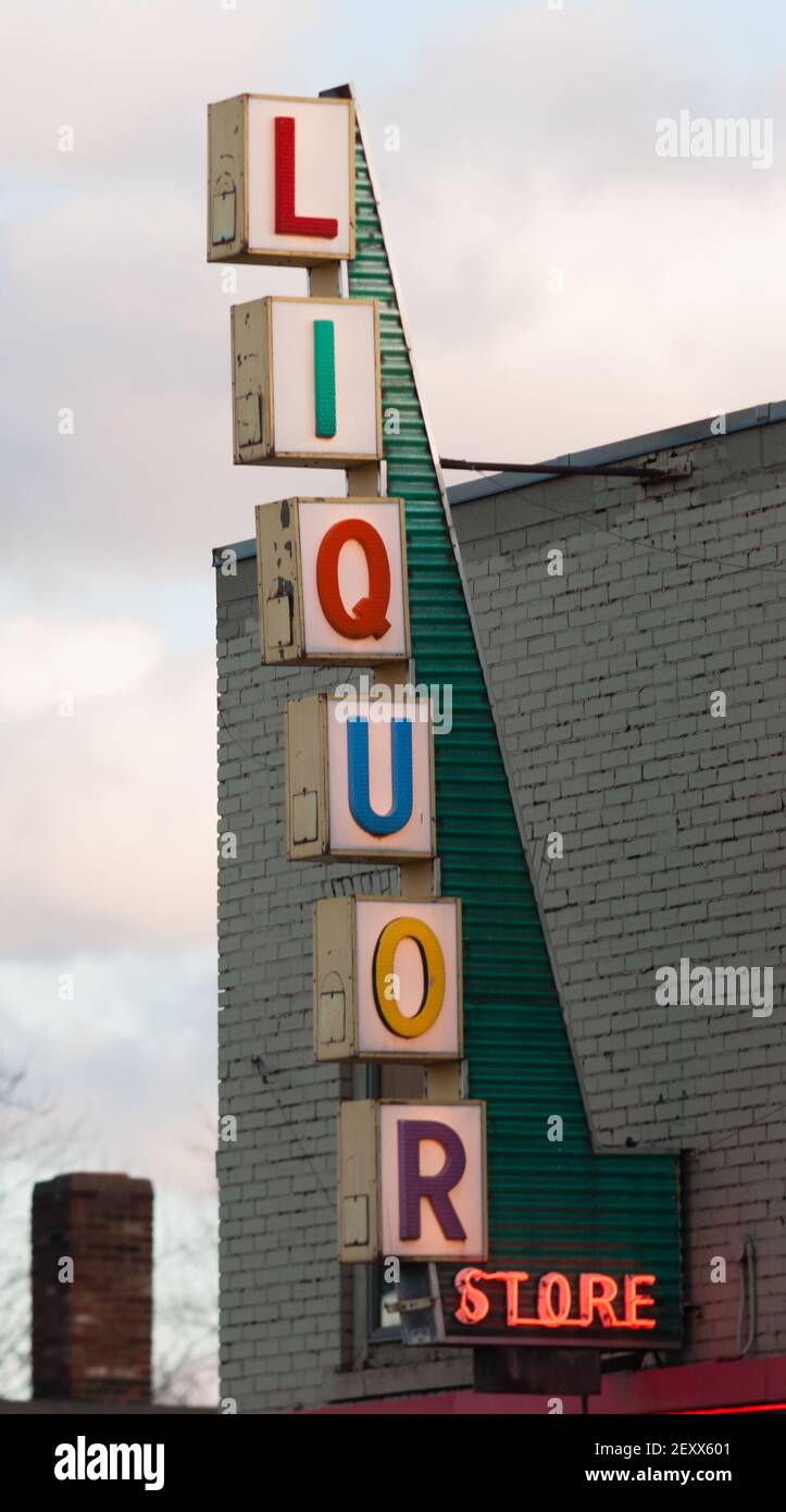 Vertical Liquor Store Sign Brick Wall Outside Advertisement Stock Photo ...