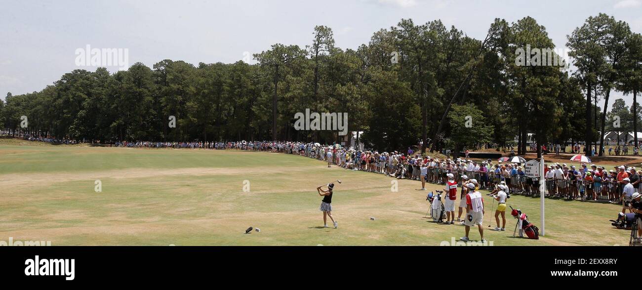 Lucy Li tees off from the first hole during the second day of the 2014 ...