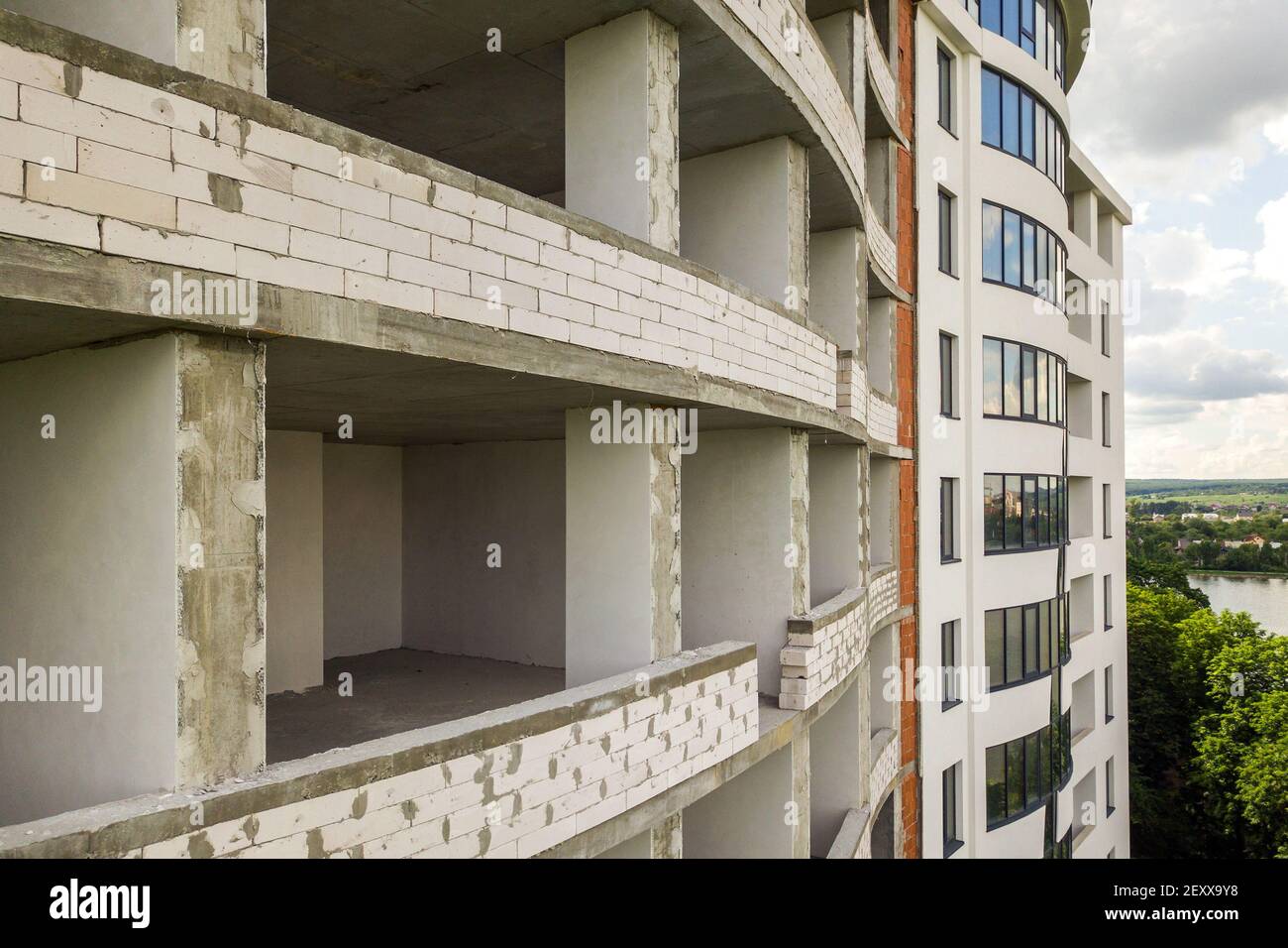 Many windows on new apartment building facade under construction Stock ...