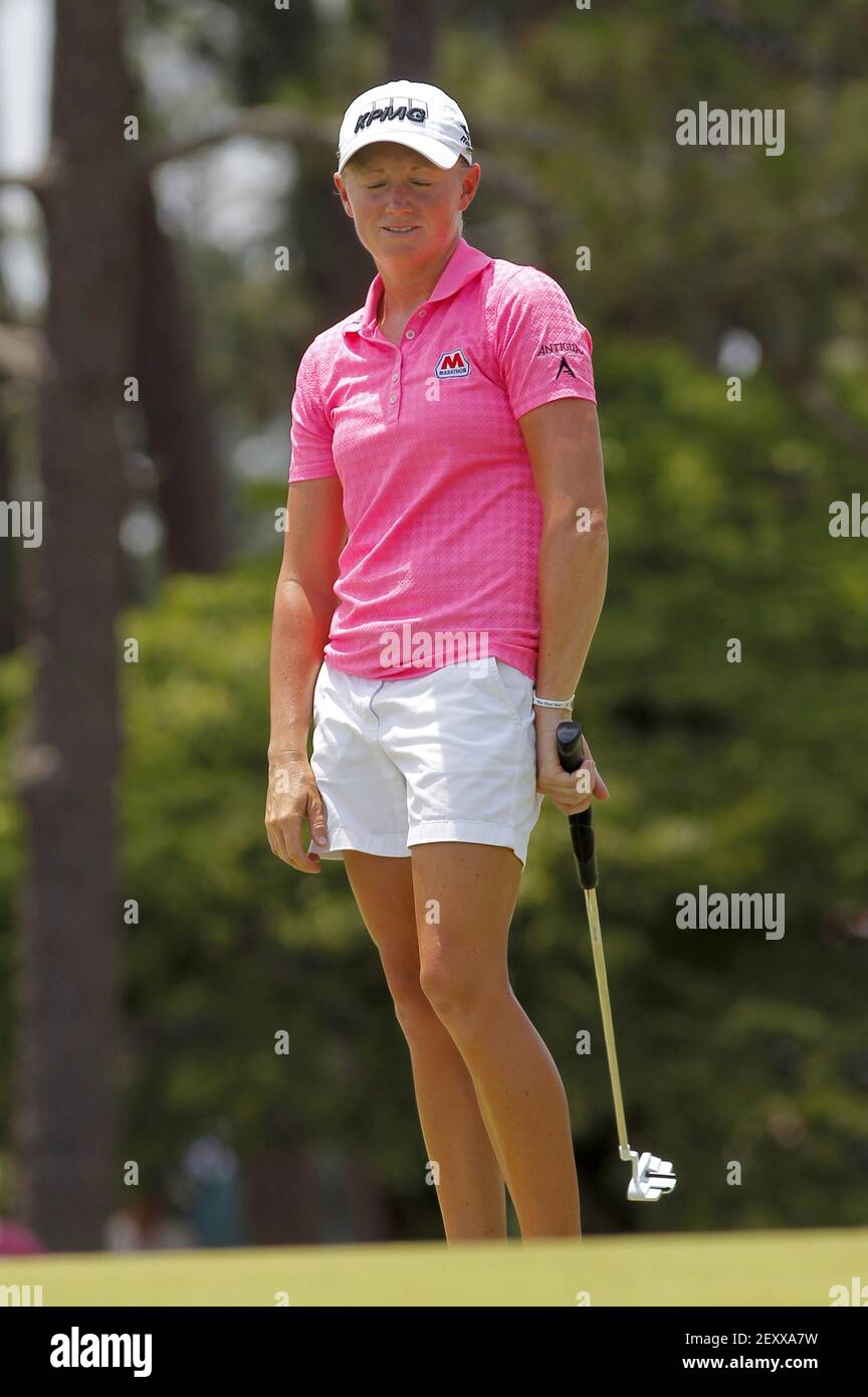 Stacy Lewis reacts after a bad putt on the third green during the third ...