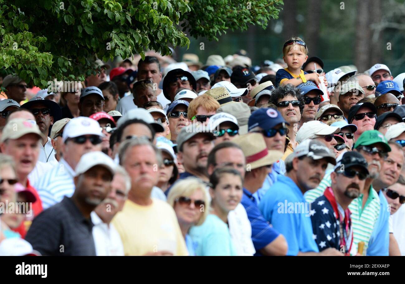 Fans, including Azariah Withy-Allen, of Fayetteville, N.C., who sits on ...