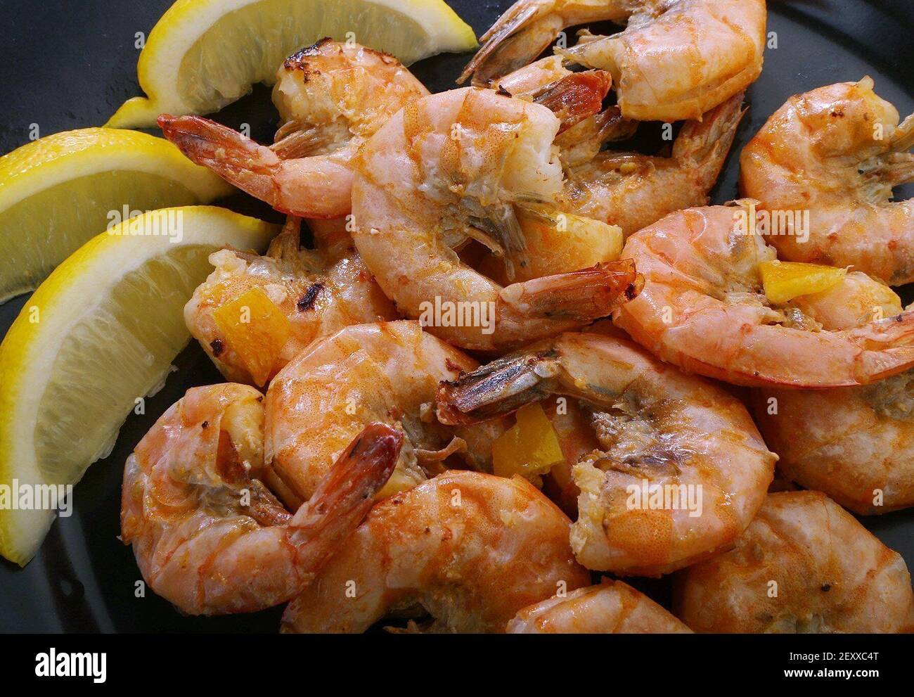 Cooked shrimp is sprinkled with preserved lemon. (Photo by J.B. Forbes ...