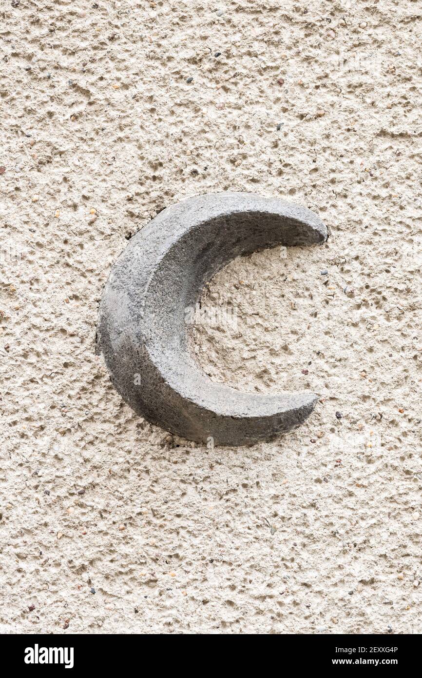 Large letter C on roughly plastered wall Stock Photo - Alamy