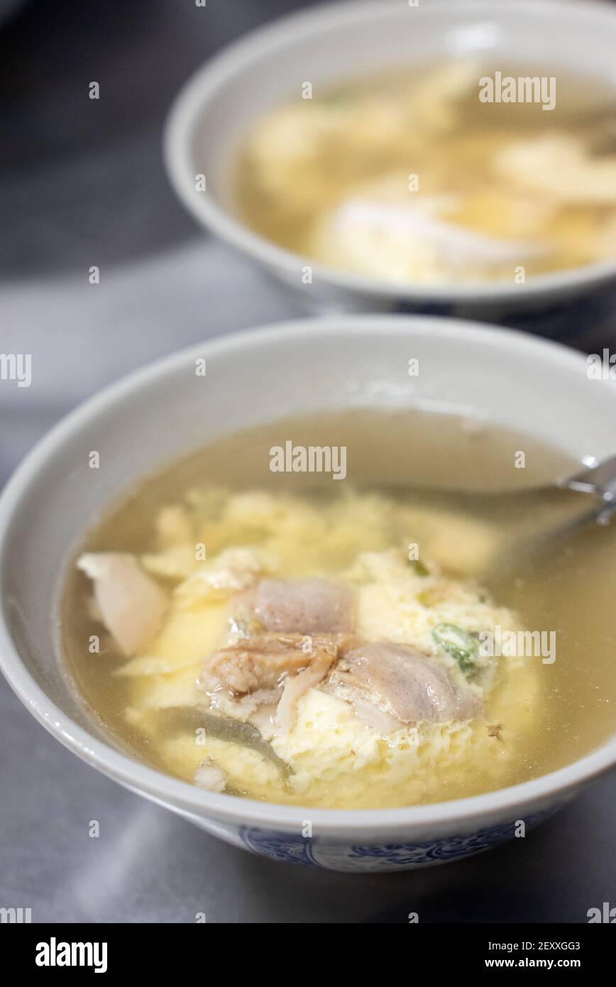 Delicious street food pig bone marrow soup with boiled egg drop in ...