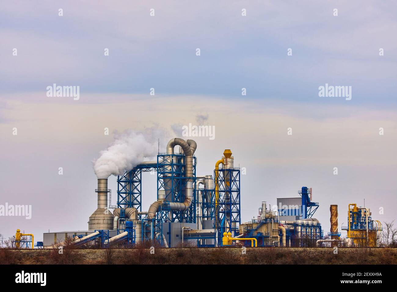 air pollution by the wood processing industry Stock Photo - Alamy