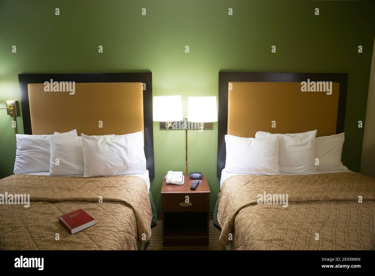 Double Queen Bed Hotel Room Travelers Motel Suite Stock Photo - Alamy
