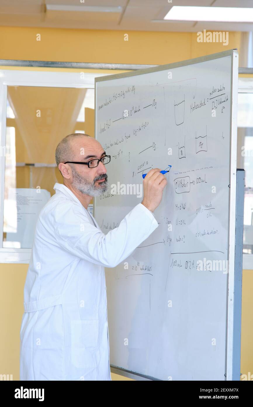School chemistry lab coat hi-res stock photography and images - Alamy