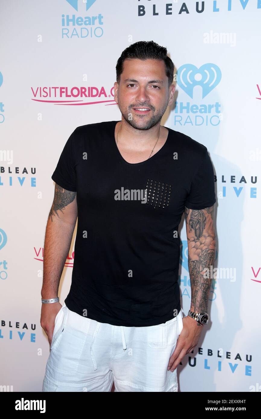 DJ Prostyle attends the iHeartRadio Ultimate Pool Party presented by ...