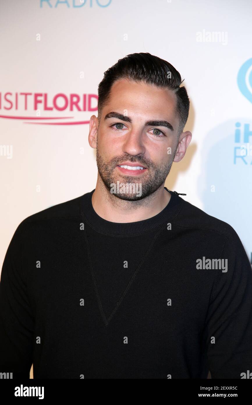 DJ E.V. attends the iHeartRadio Ultimate Pool Party presented by VISIT ...