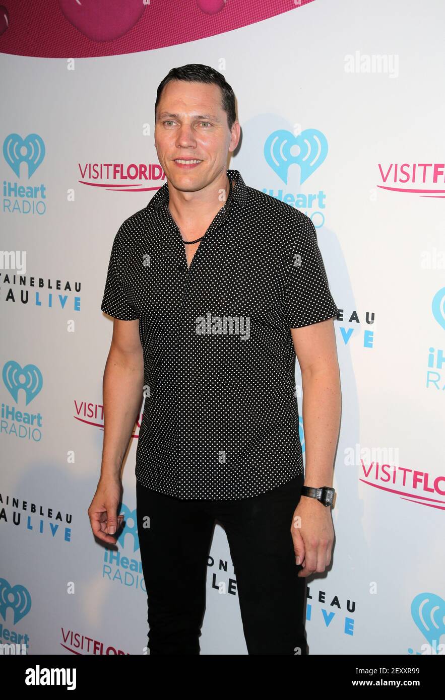 DJ Tiesto attends the iHeartRadio Ultimate Pool Party presented by ...