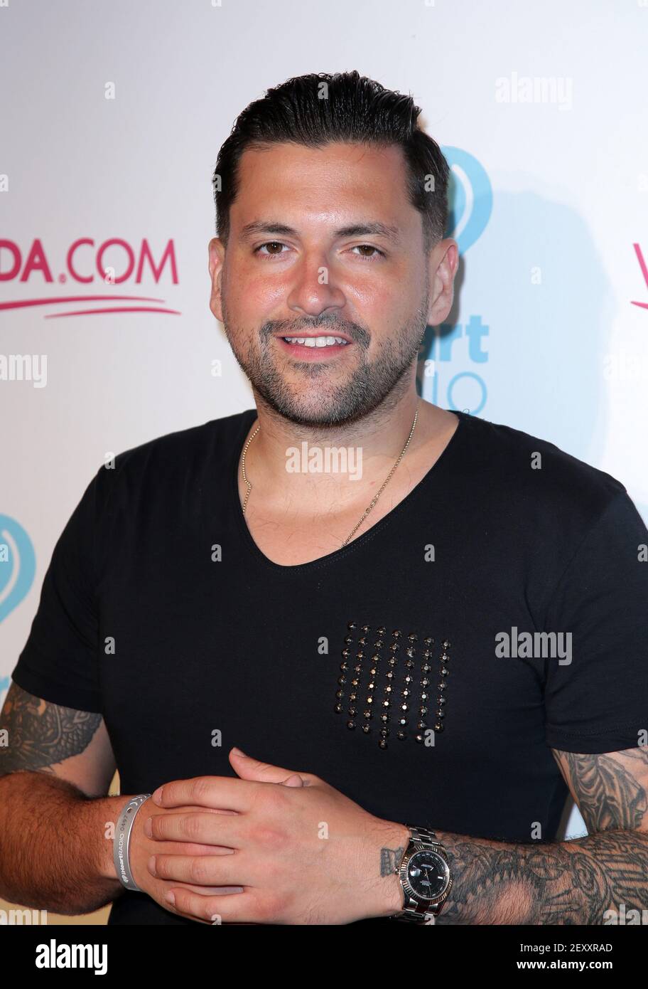 DJ Prostyle attends the iHeartRadio Ultimate Pool Party presented by ...