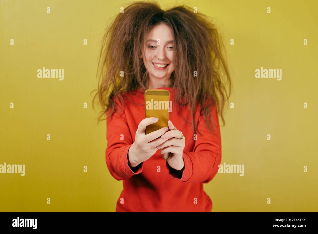 woman with a strange hairdo makes a selfie photo Stock Photo - Alamy