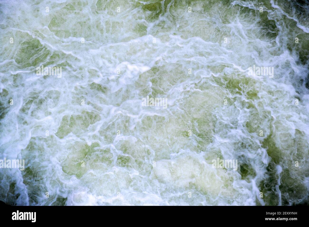 Aerial view of river waterfall with clear turquoise water falling down ...