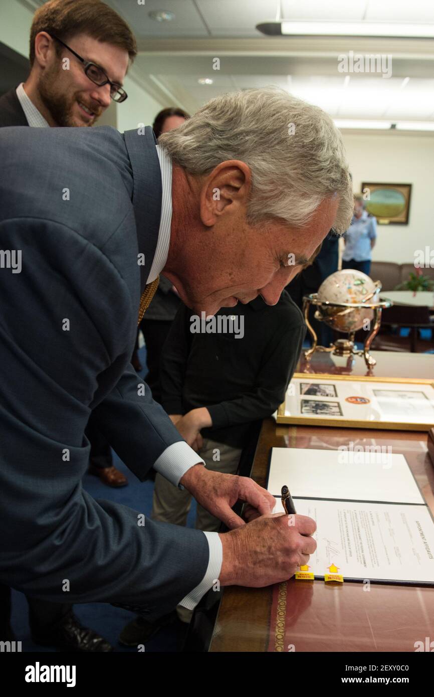 Secretary of Defense Chuck Hagel swears in Dr. Jamie M. Morin as ...