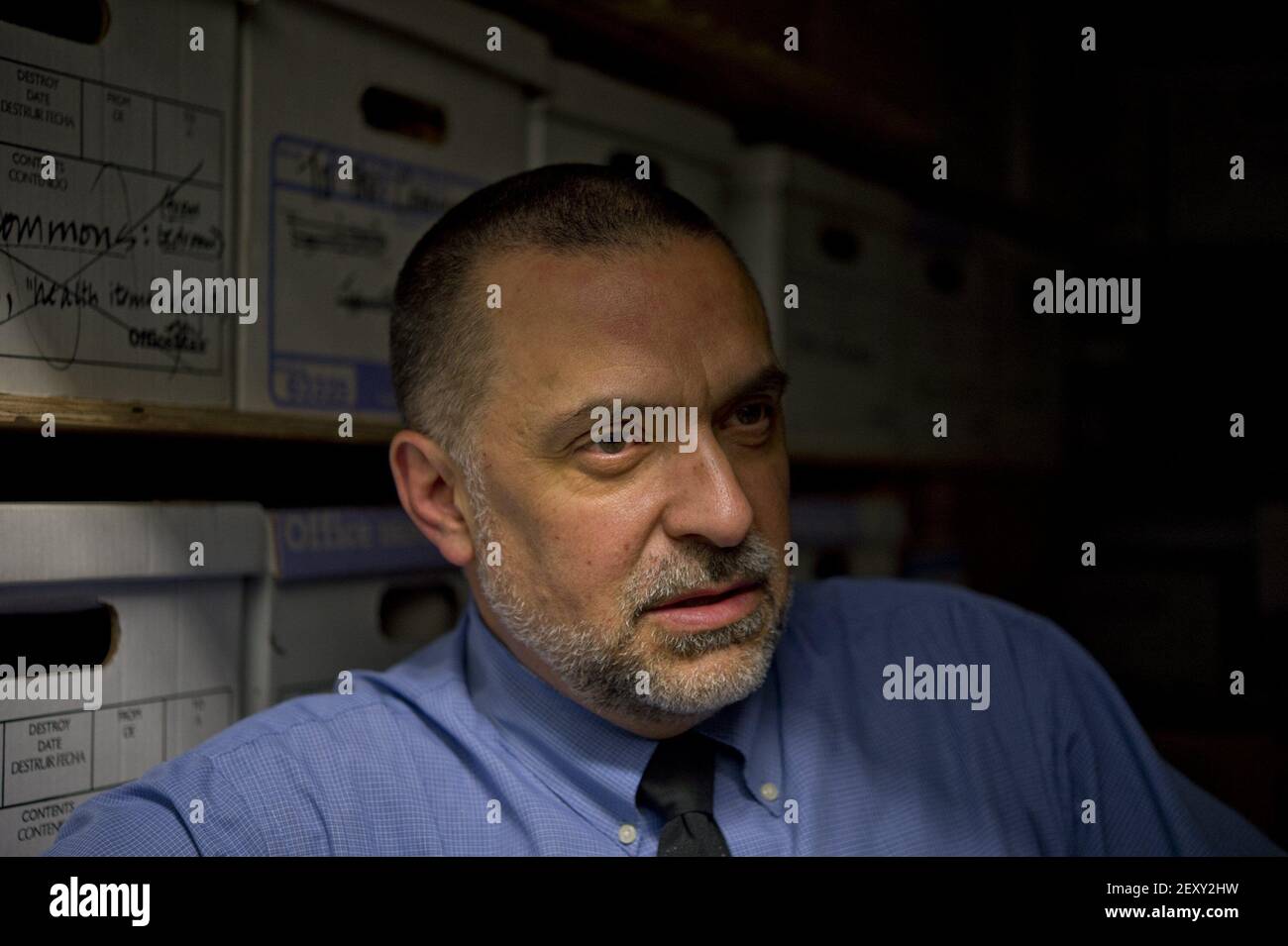 Alan Miller stands in the doorway of a storage unit that contains ...