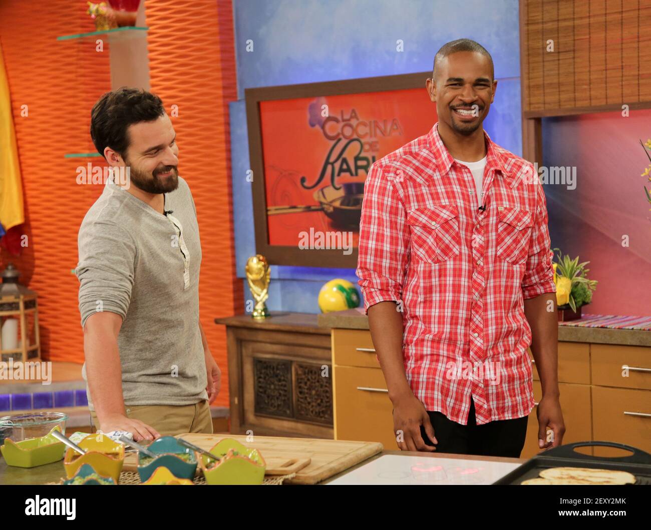 Jake Johnson and Damon Wayans Jr. are seen on the set of Despierta ...