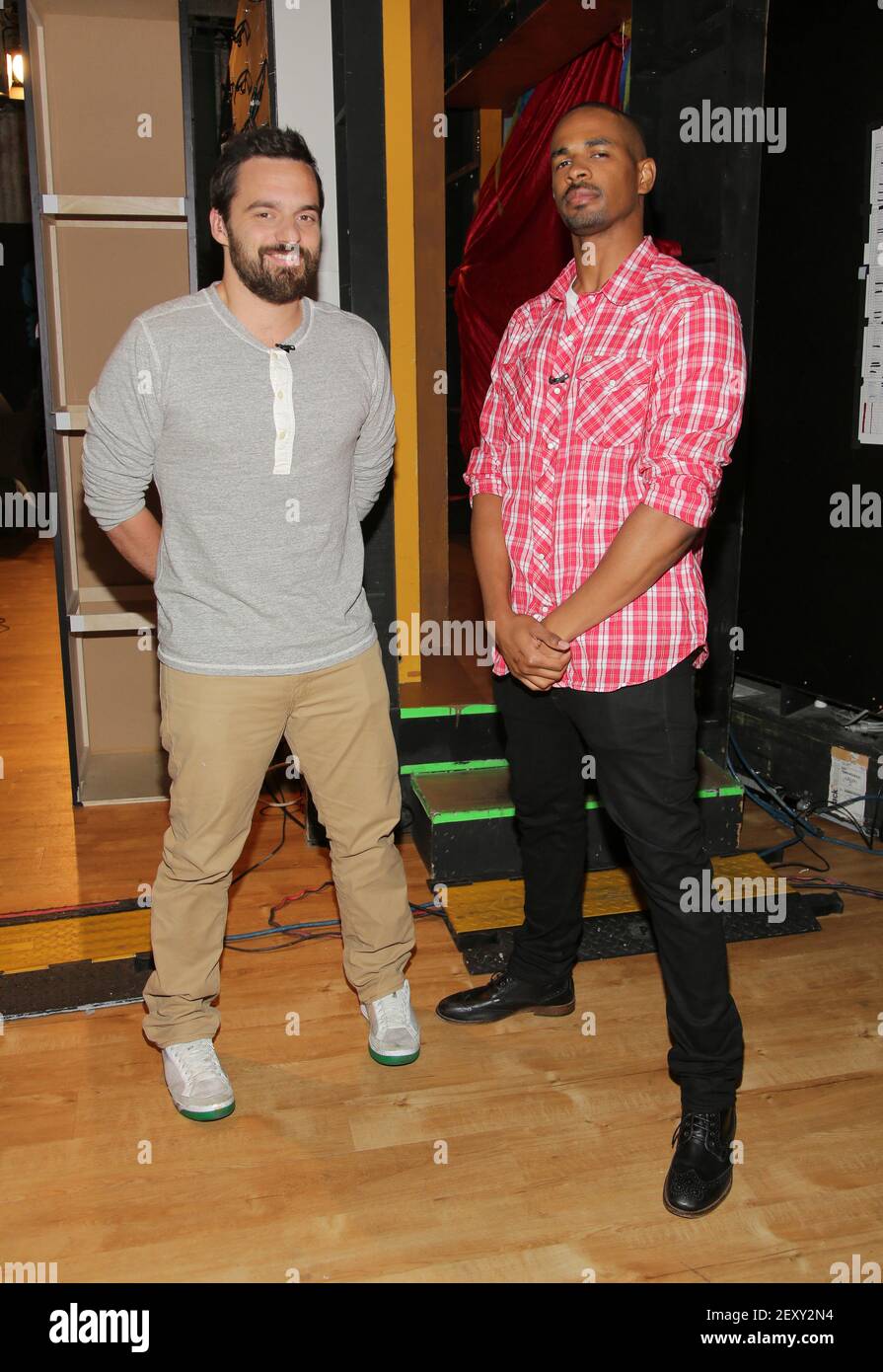 Jake Johnson and Damon Wayans Jr. are seen on the set of Despierta ...