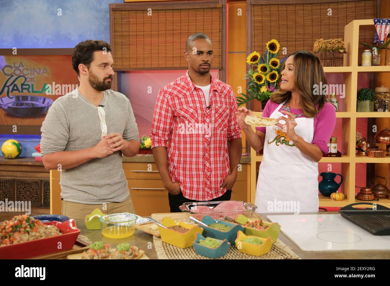 Jake Johnson, Damon Wayans Jr. and Karla Martinez are seen on the set ...