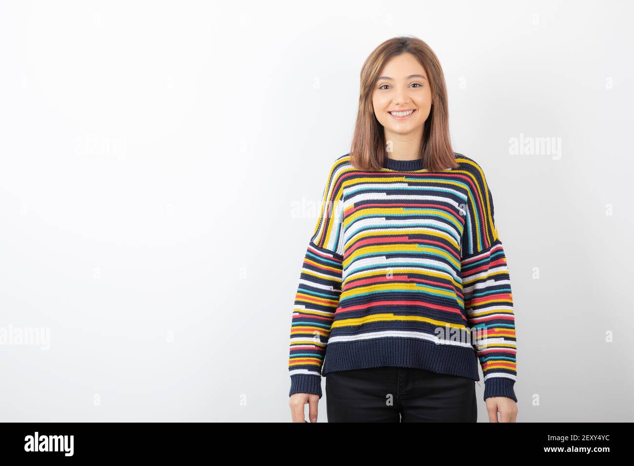 Portrait photo of a young cute woman model standing and posing Stock ...