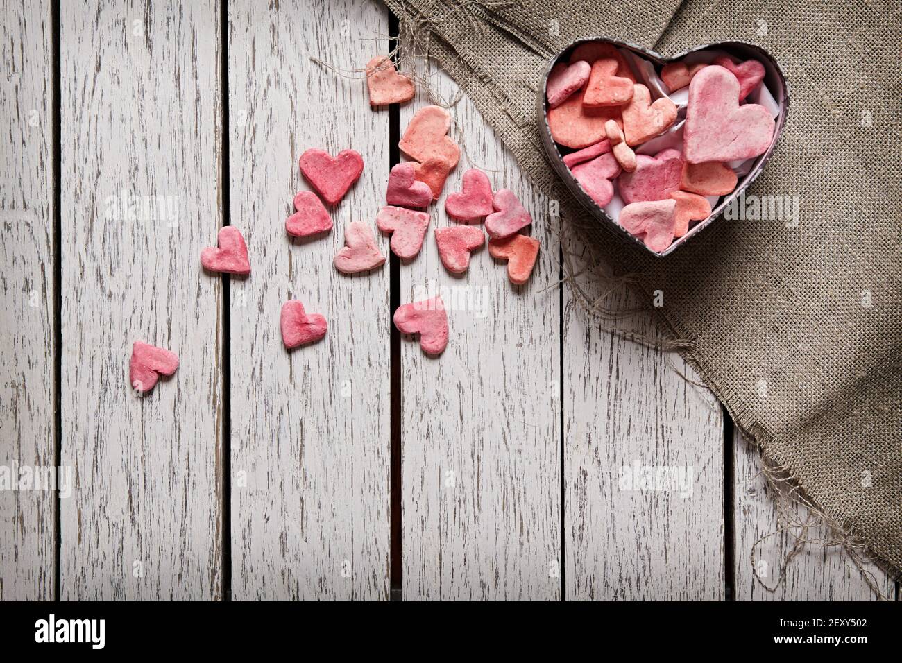 Open heart shaped gift box with heap of hearts Stock Photo - Alamy