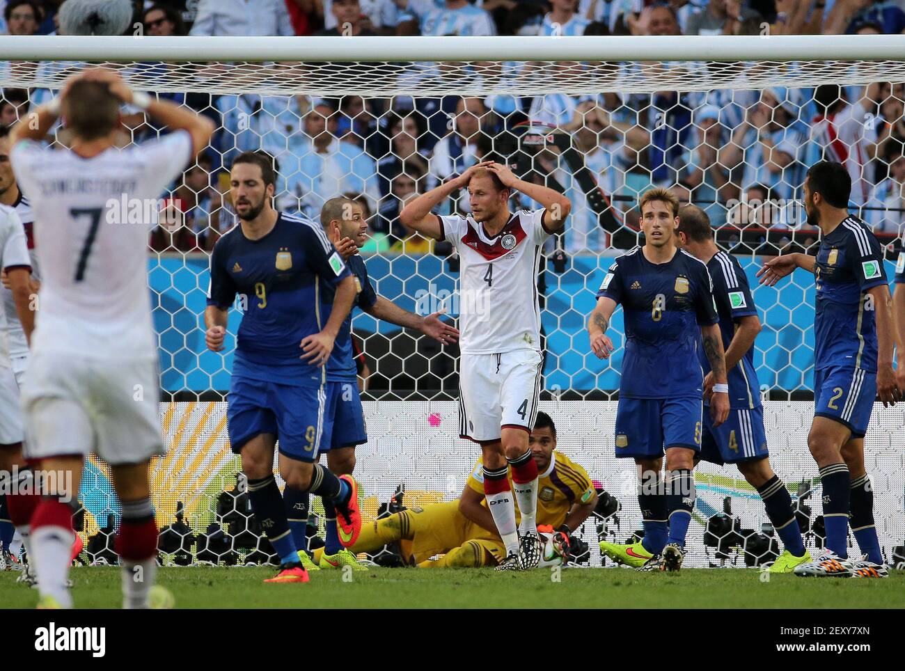 Germany's players reacting after a missing chance during the 2014 FIFA ...