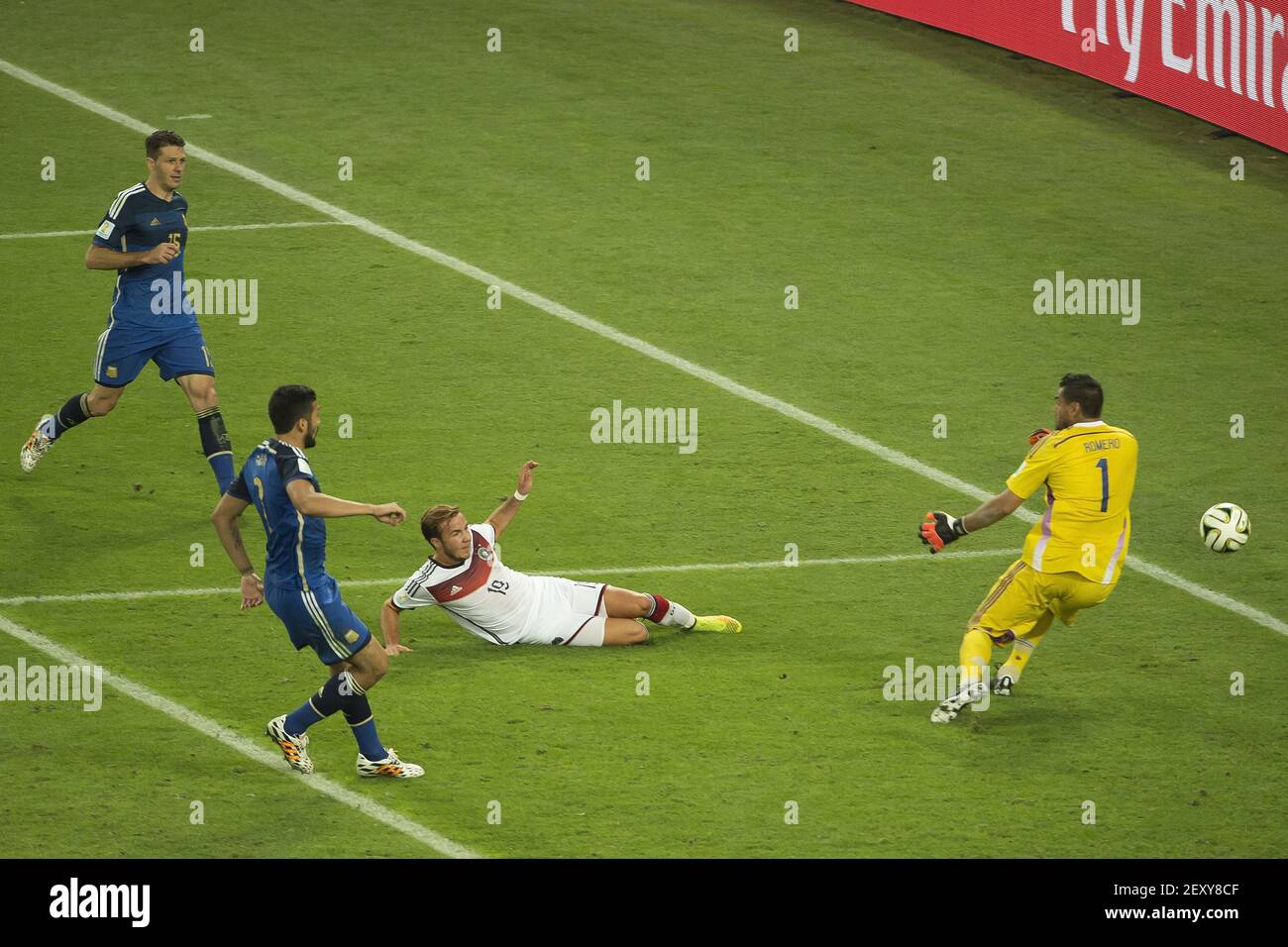 Germany's Mario Goetze (C) scoring a goal during the 2014 FIFA World ...