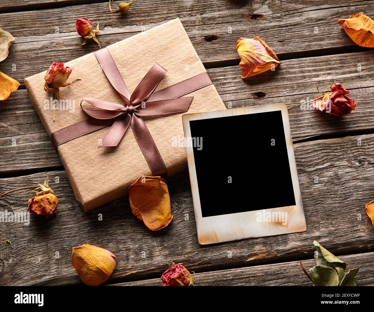 Blank photo frame with gift box Stock Photo - Alamy