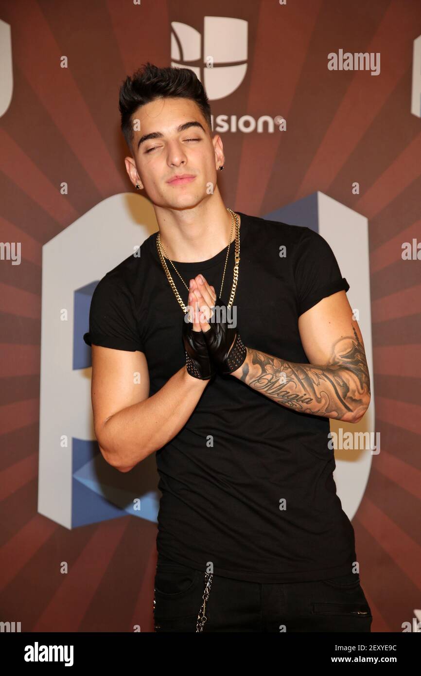 Maluma poses in the press room during the Premios Juventud 2014 at The ...