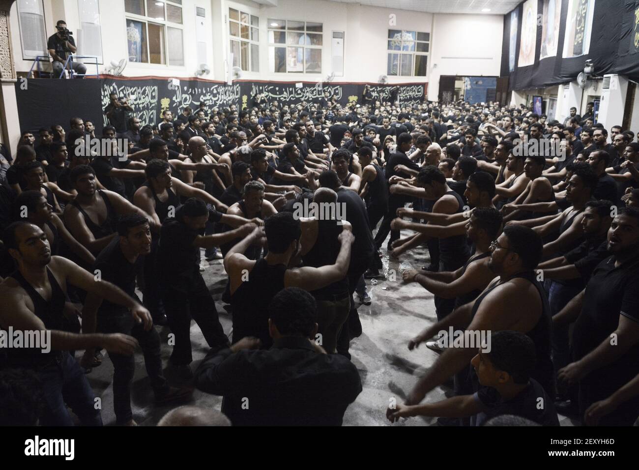 MANAMA, BAHRAIN - JULY 17, 2014 - Shiite Muslims perform dance ritual ...